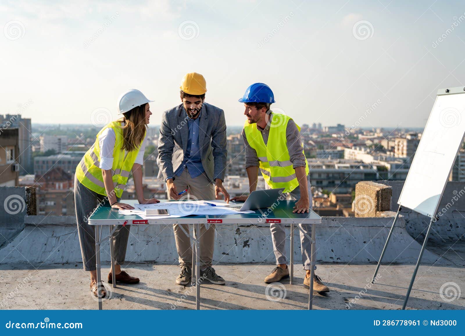 Group of Engineers, Architects, Business Partners at Construction Site ...