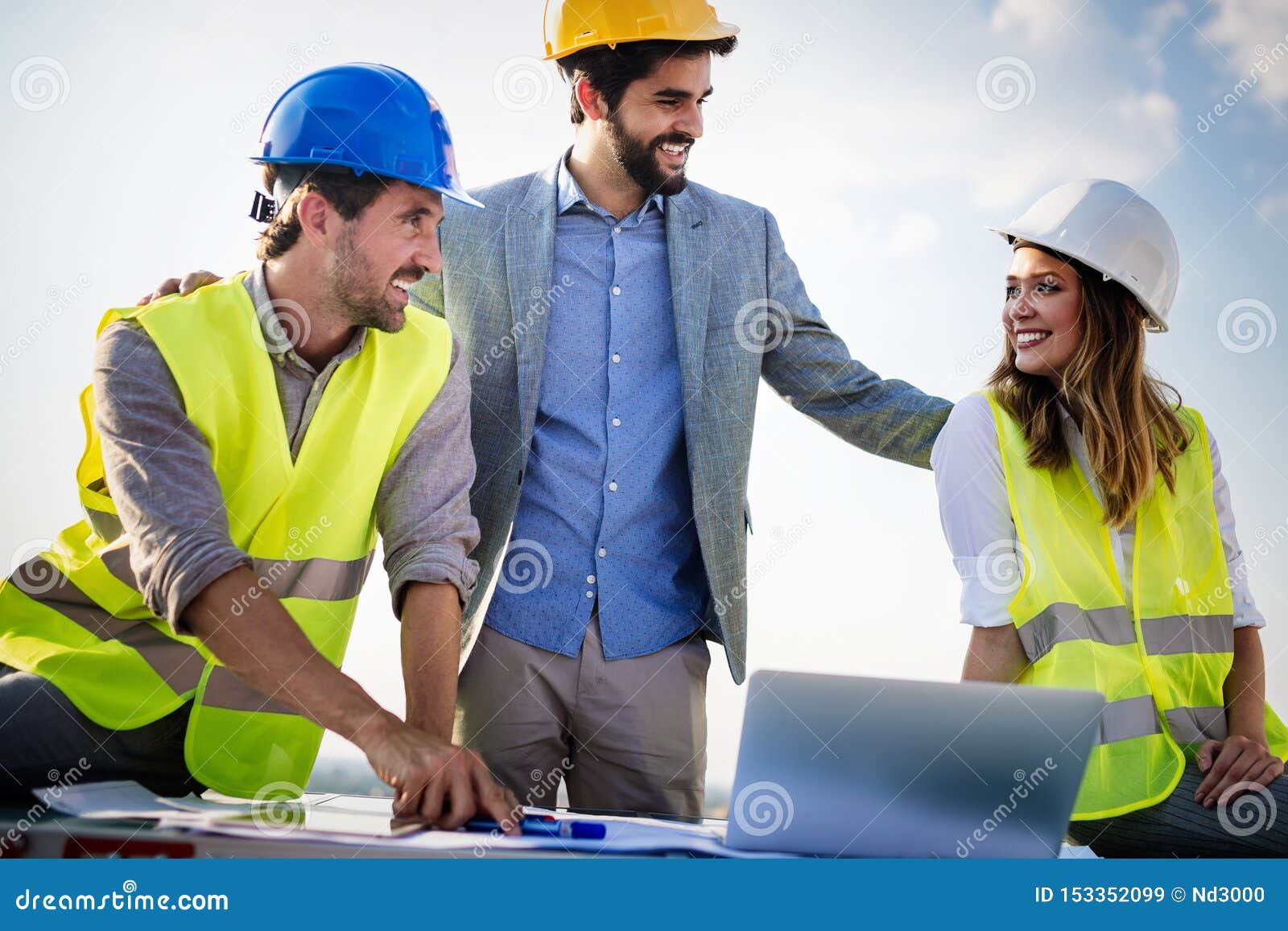 Group of Engineers, Architects, Business Partners at Construction Site ... Group of Engineers, Architects, Business Partners at Construction Site ...