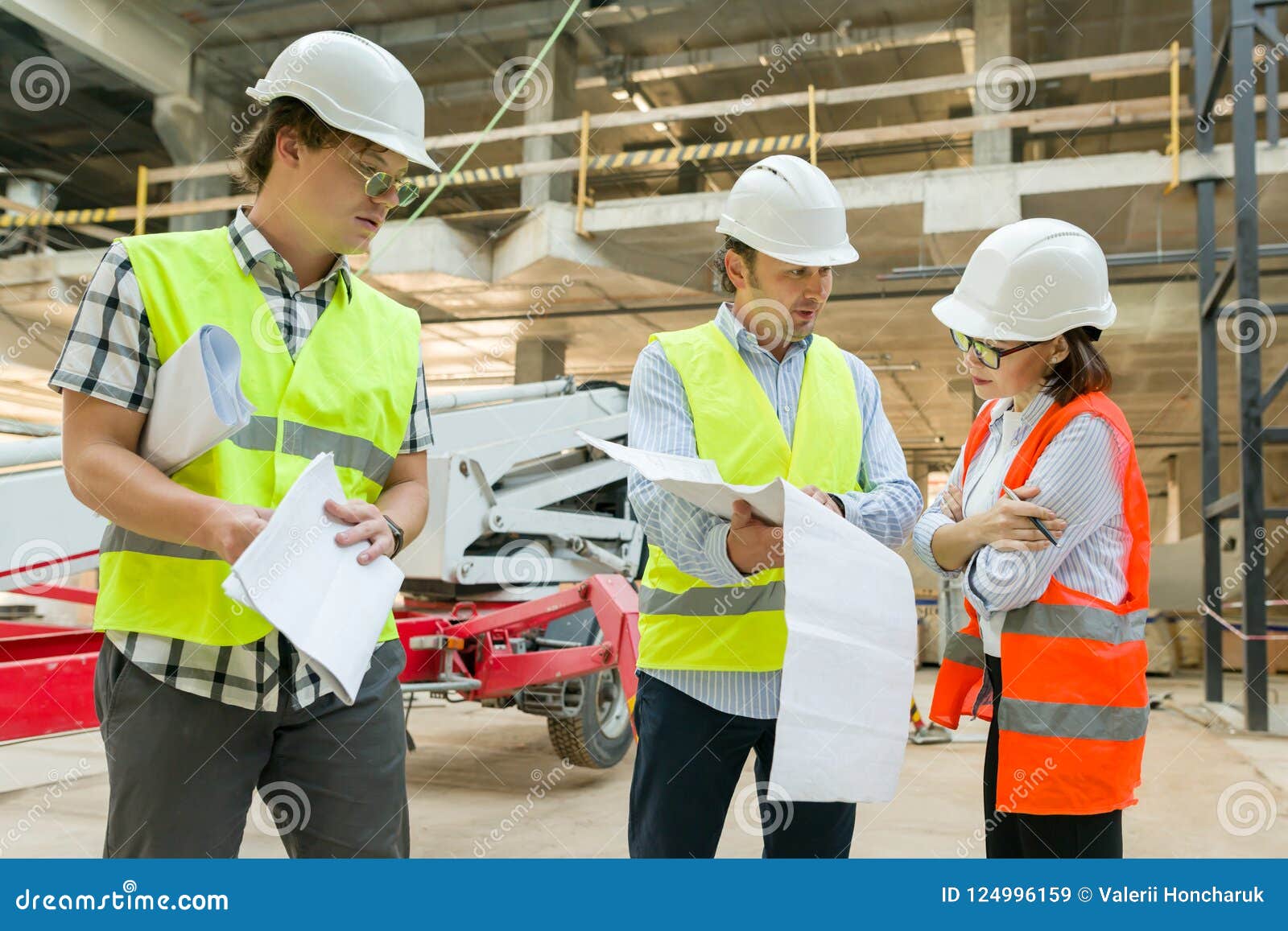 Group of Engineers, Builders, Architects on the Building Site ...