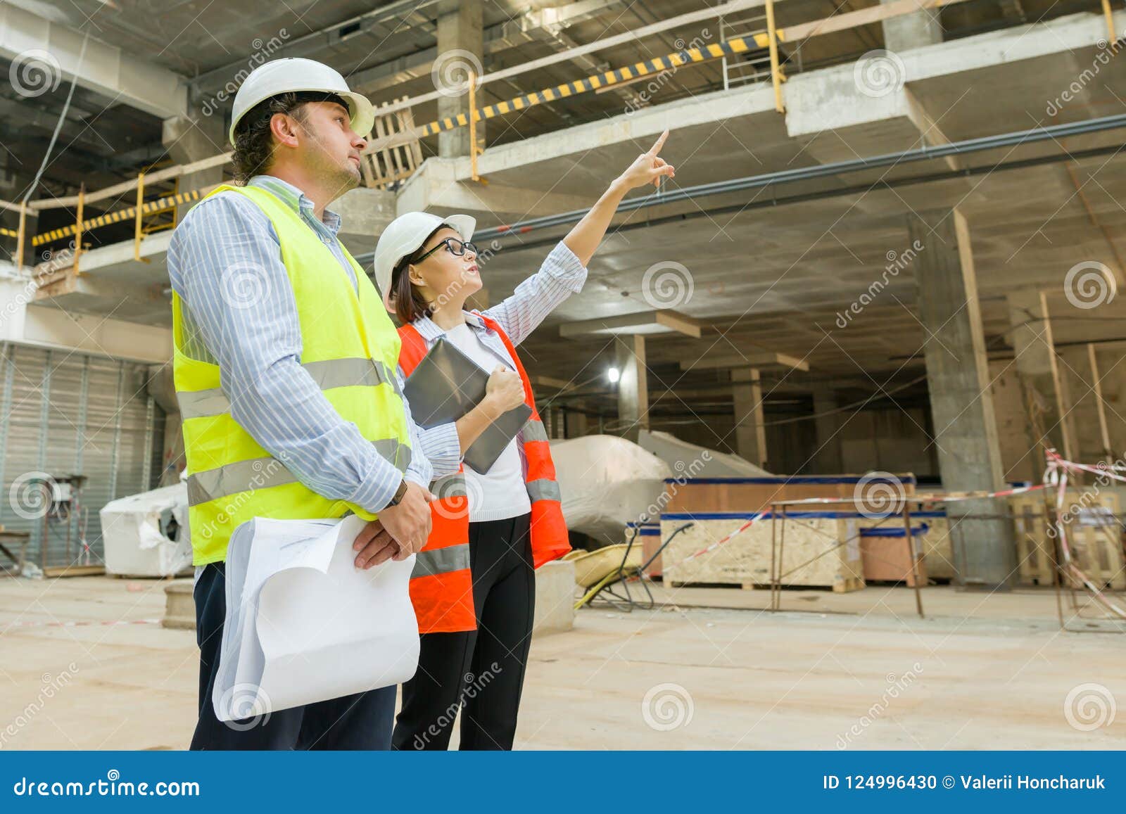 Group of Engineers, Builders, Architects on the Building Site ...