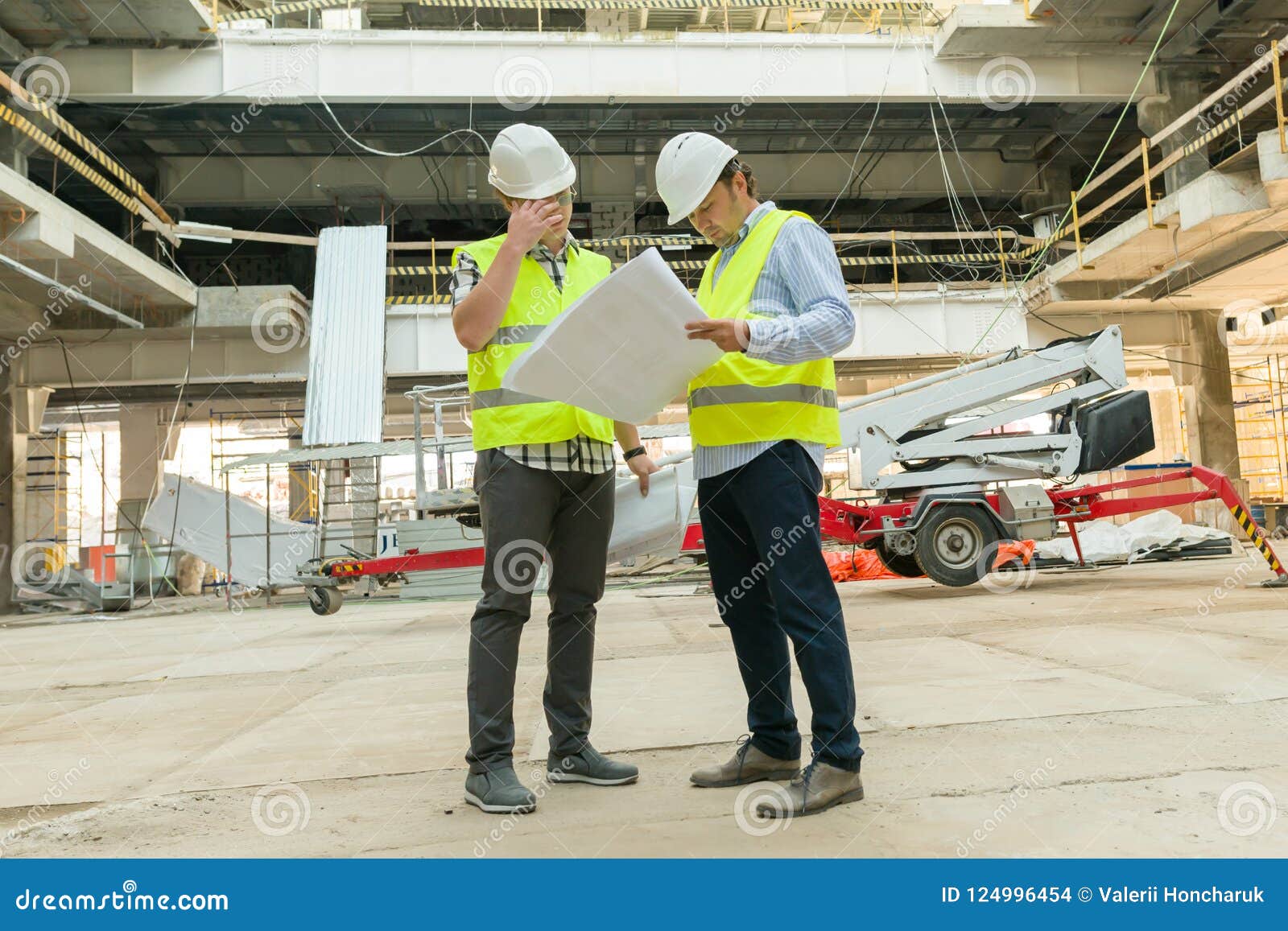 Group of Engineers, Builders, Architects on the Building Site ...