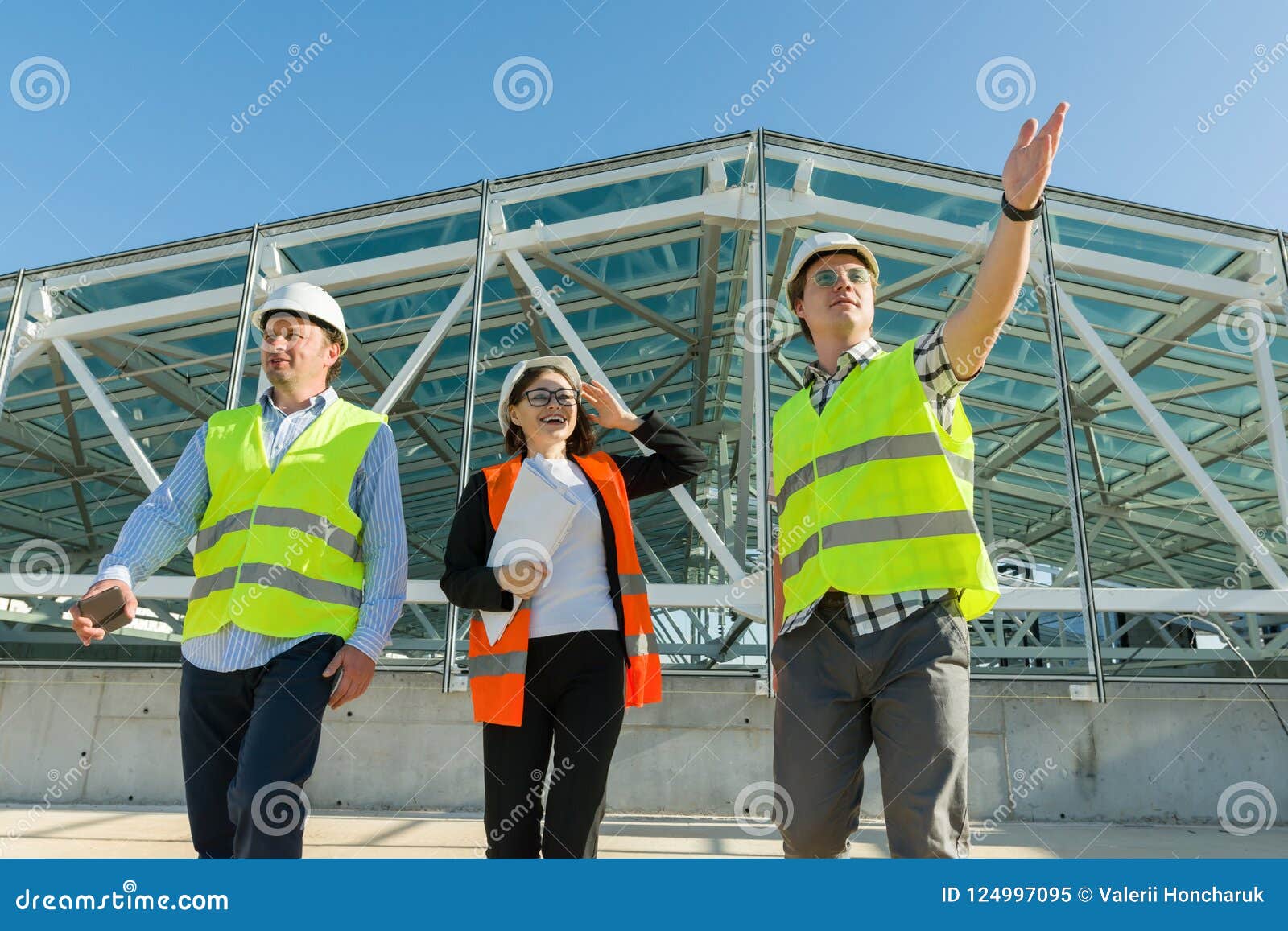 Group of Engineers, Builders, Architects on the Building Site ...