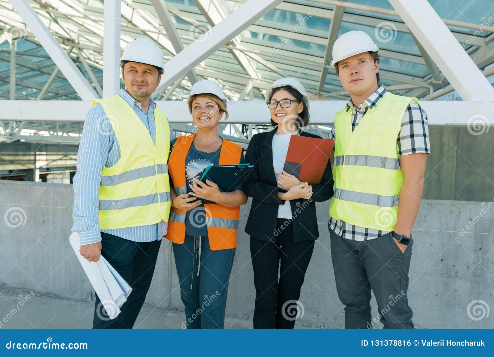 Group of Engineers, Builders, Architects on the Building Site ...