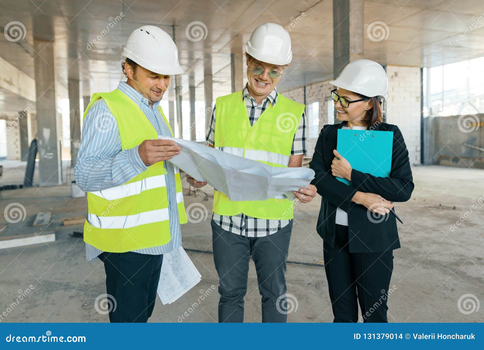 Group of Engineers, Builders, Architects on the Building Site ...
