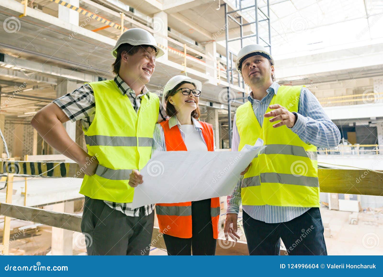 Group of Engineers, Builders, Architects on the Building Site ...