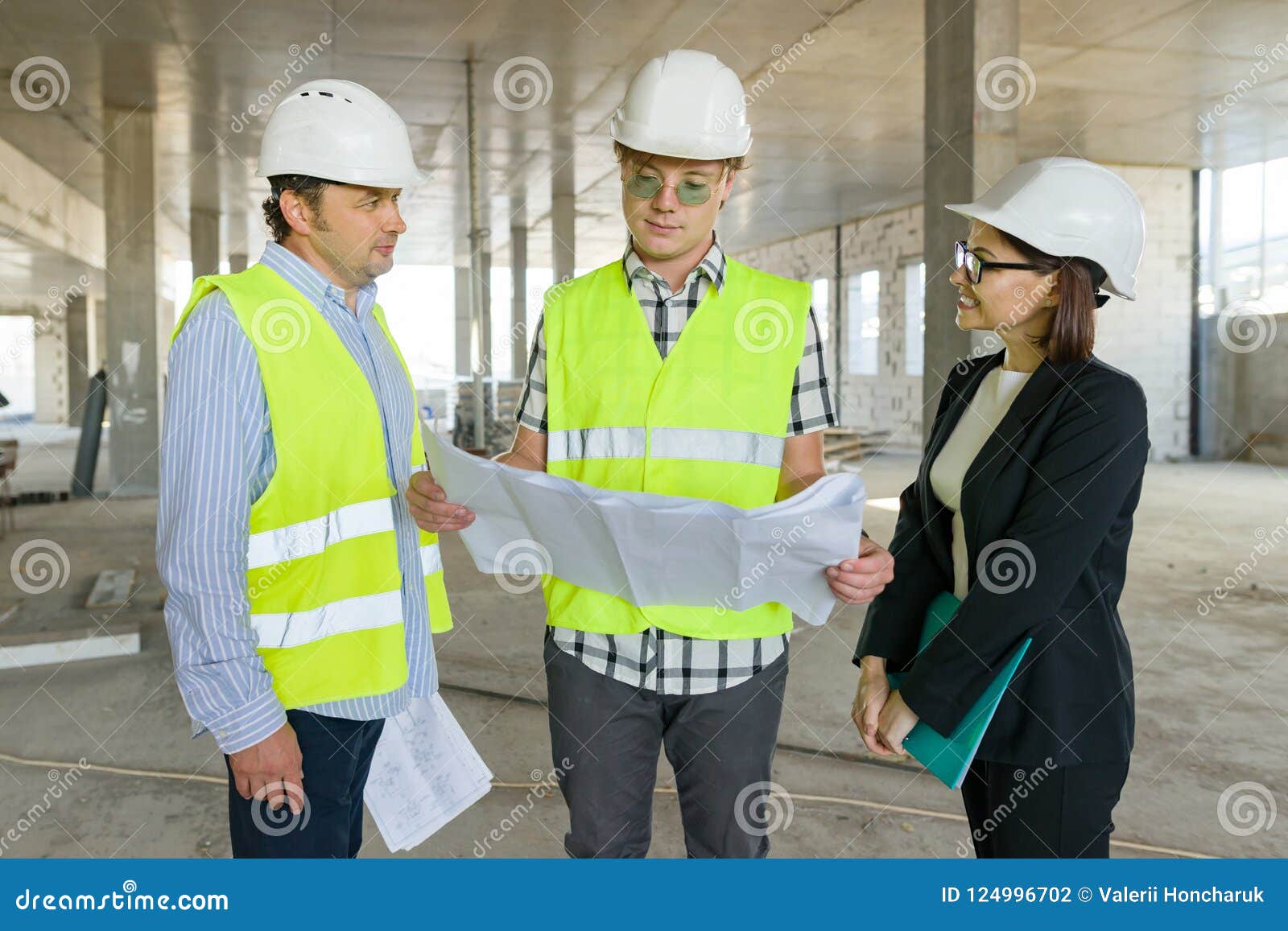 Group of Engineers, Builders, Architects on the Building Site ...