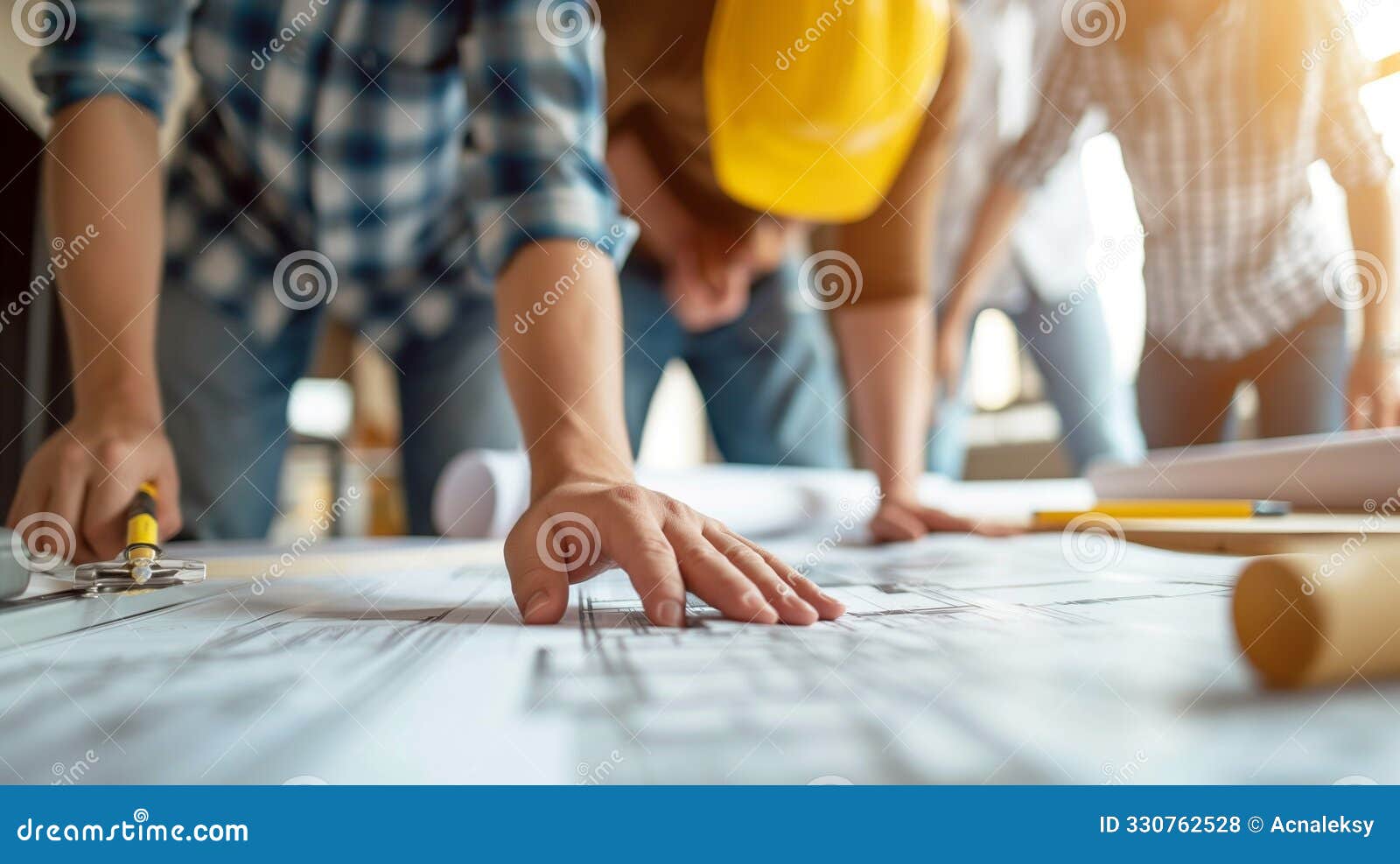 Group of Engineers Discussing Blueprints and Planning the Design Stock ...