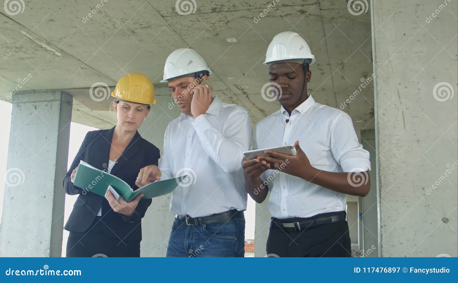 Group of Engineers and Experts Discuss about Construction Site Stock ...
