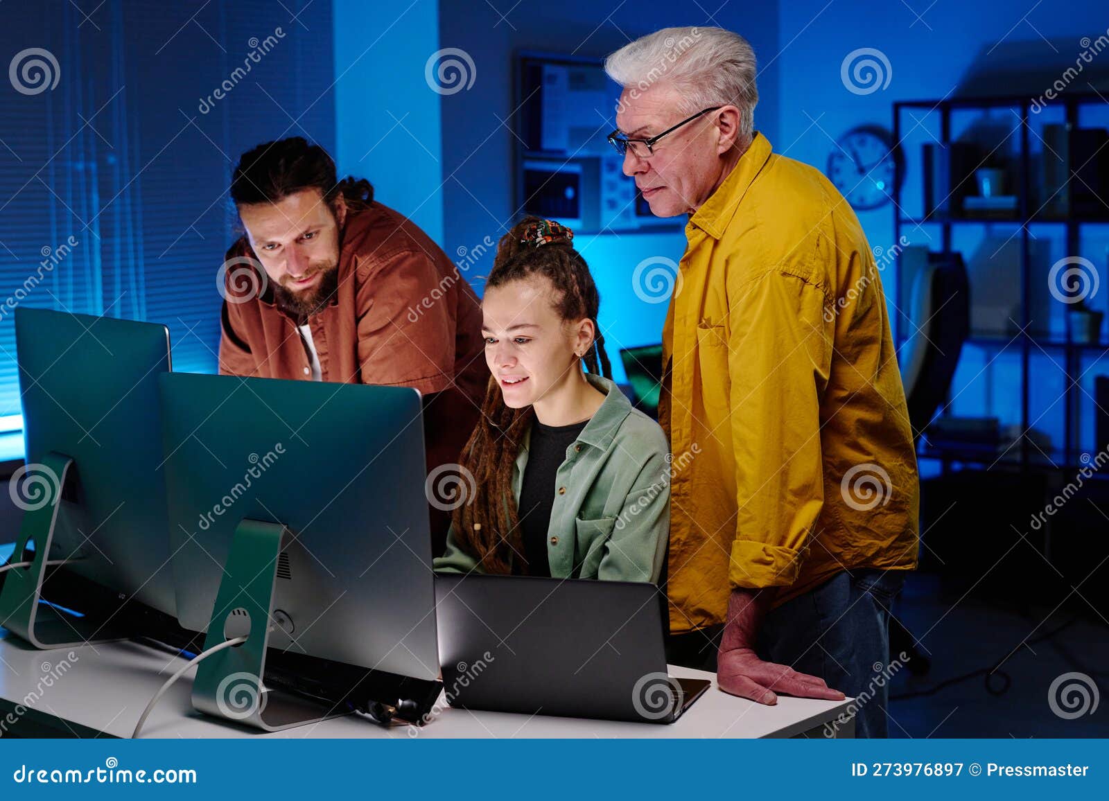 Group of it Engineers Looking at Screen of Desktop Computer Stock Image ...