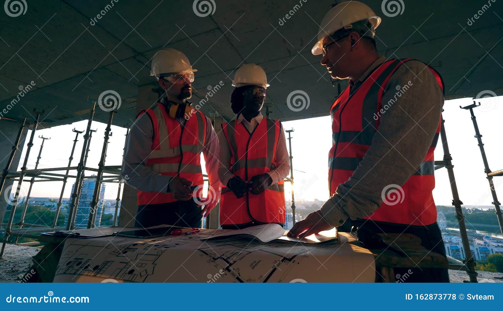 Group of Engineers are Planning a Construction Project Stock Footage ...
