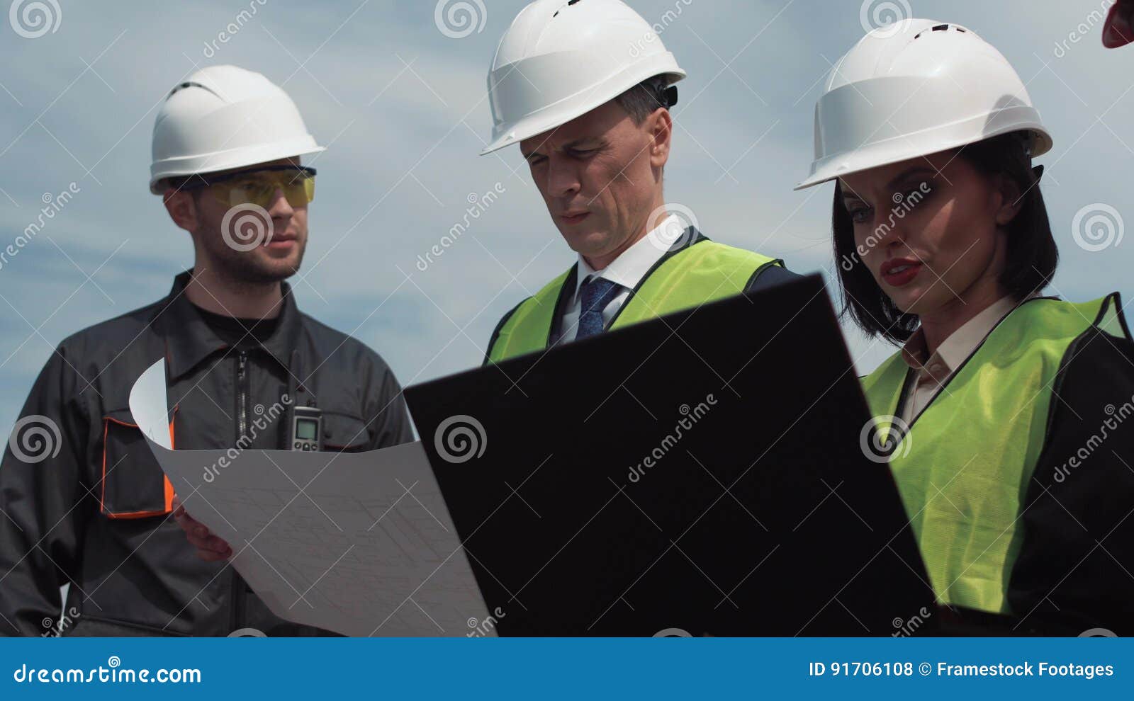 Group of Engineers or Technicians Discuss Blueprint Stock Photo - Image ...