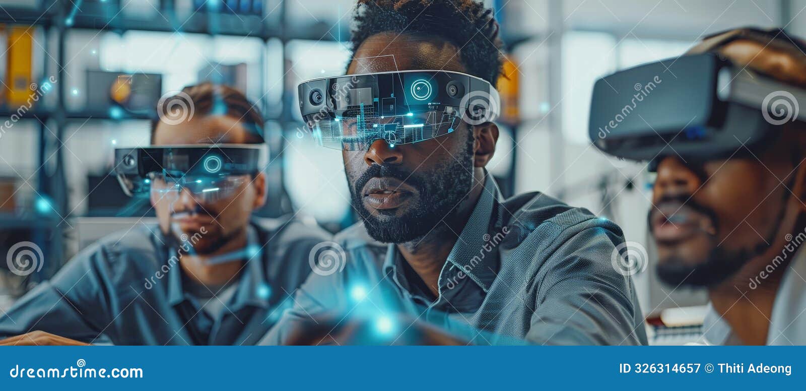 Group of Engineers Using Augmented Reality and Virtual Reality Headsets ...