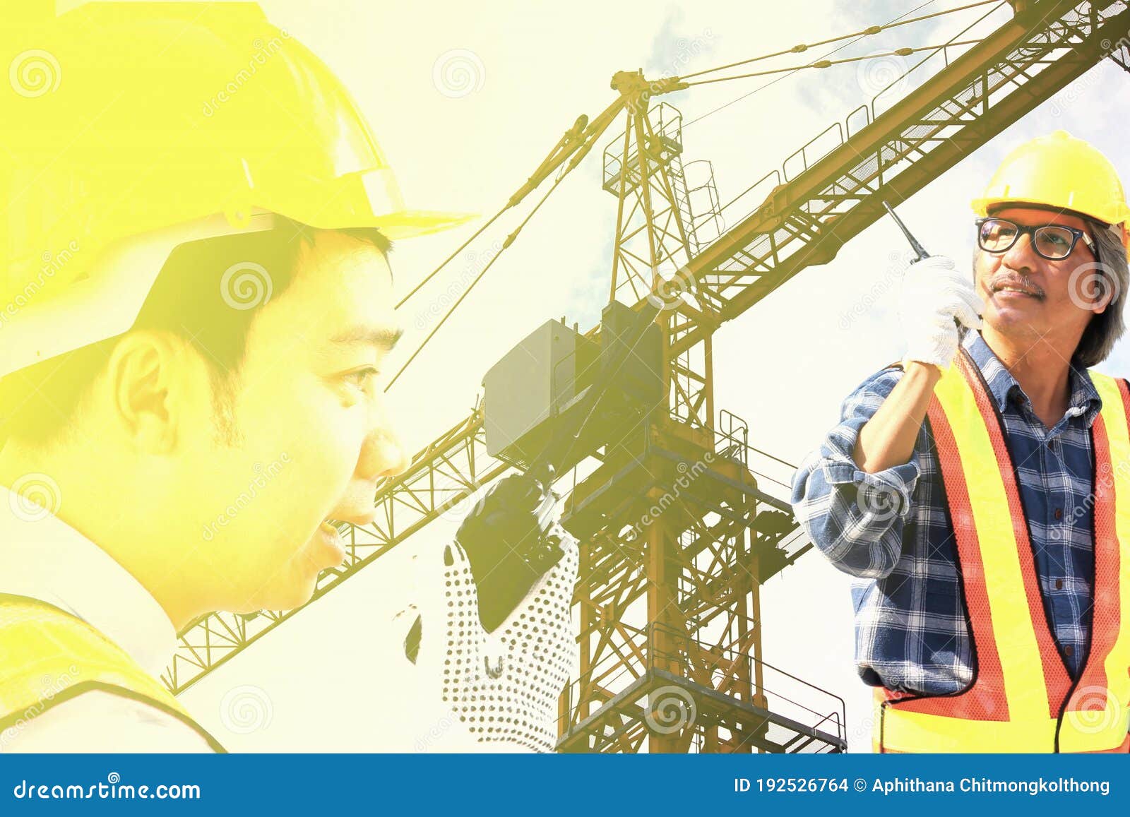 Group of Engineers Using Radio Communication in Big Construction Site ...
