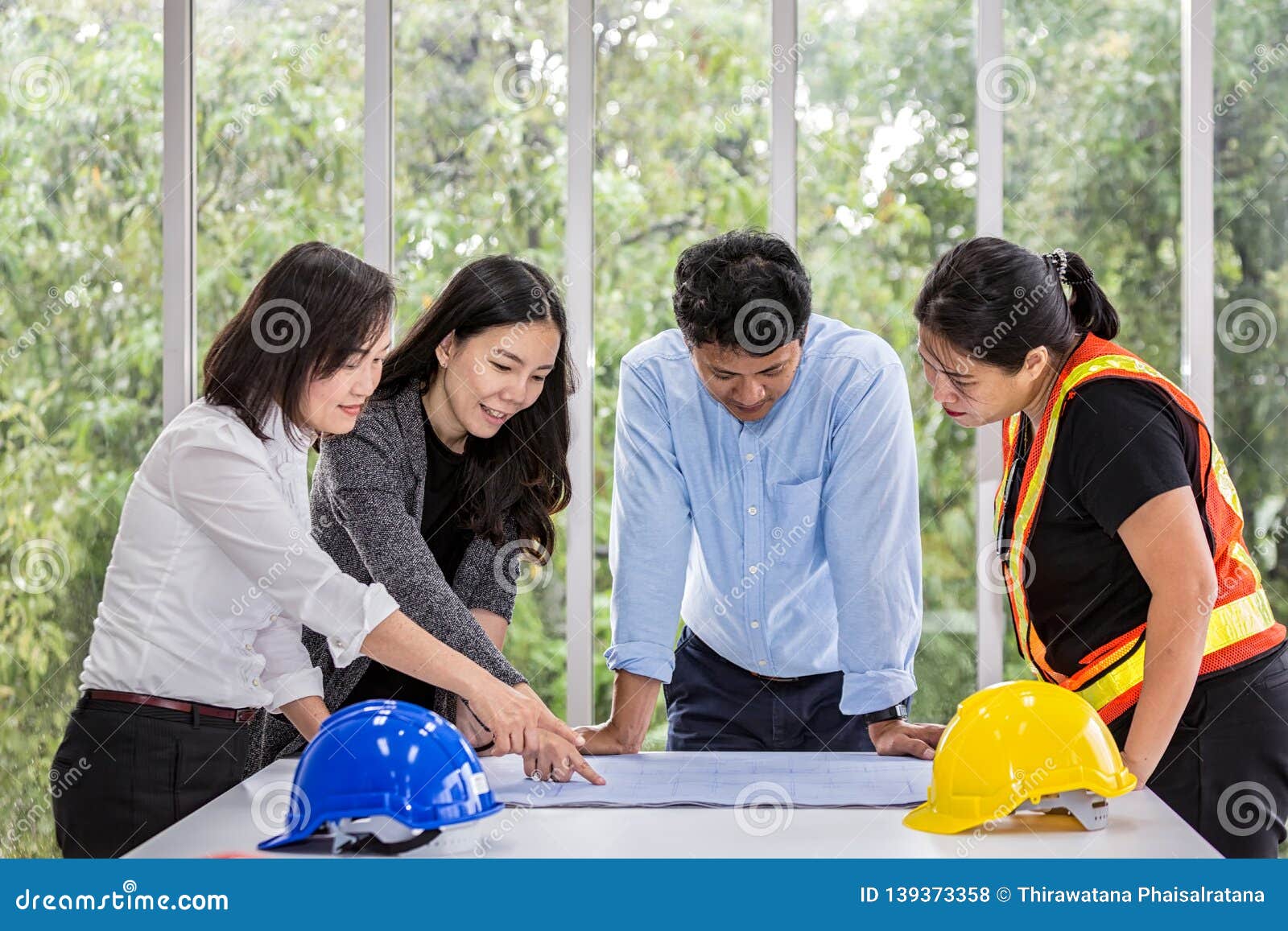 Group Engineers Working Meeting Room at the Office. Team Workers are ...
