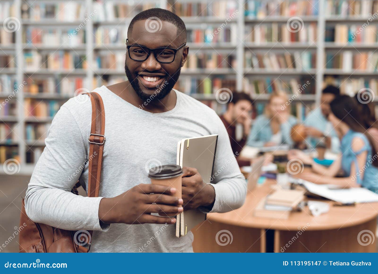 Group of Ethnic Multicultural Students in Library. Black Guy with Notes ...