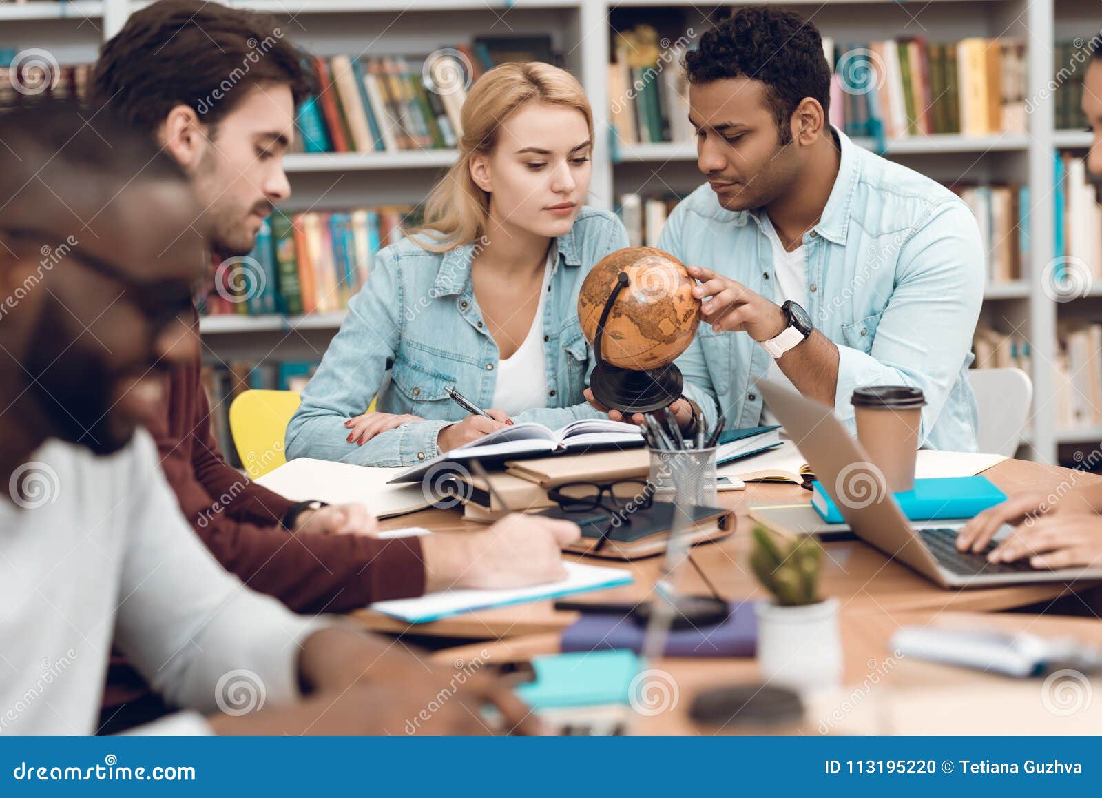 Group of Ethnic Multicultural Students in Library. Students are ...
