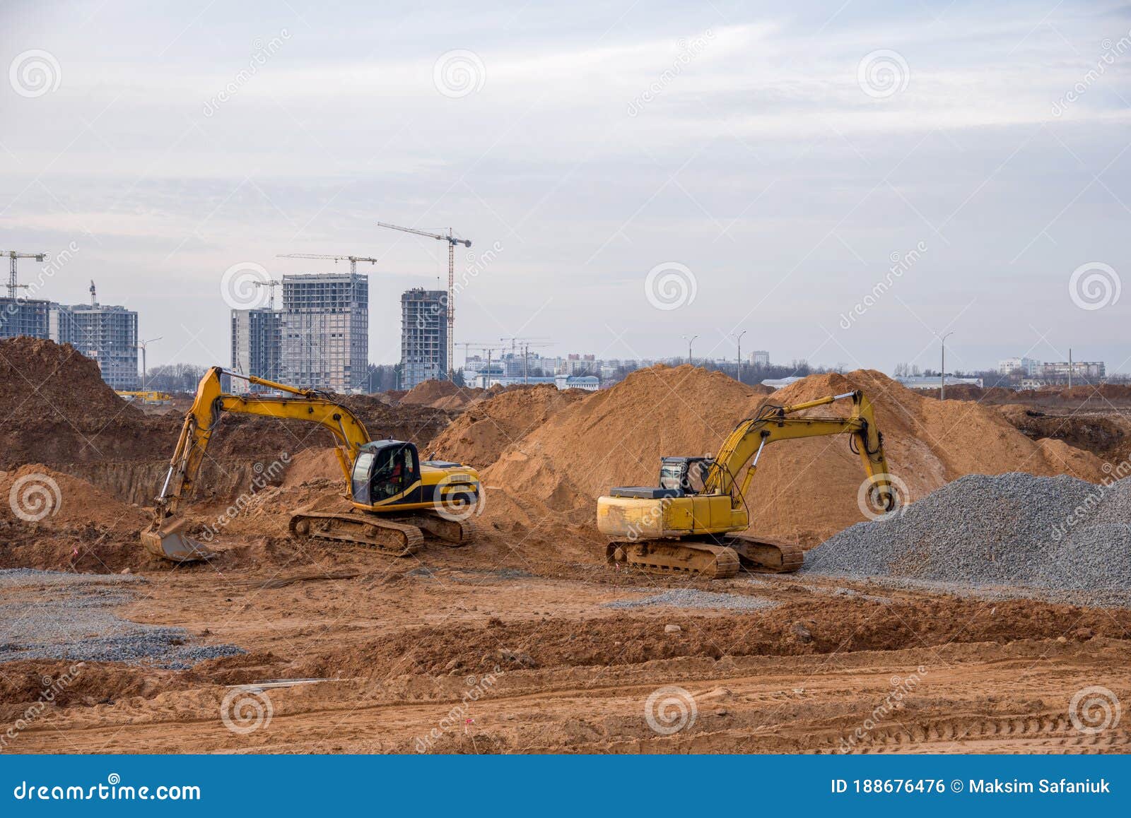 Group of the Excavators for Dig Ground Trenching at a Construction Site ...