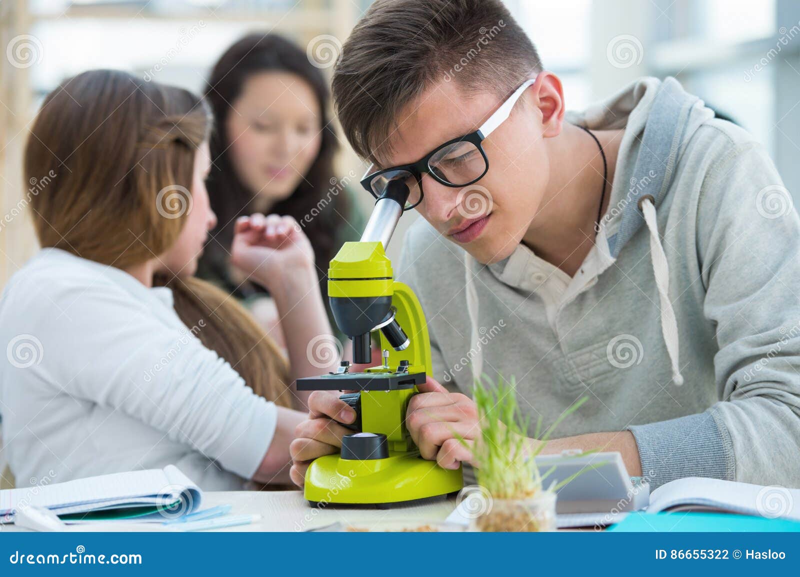 Group of Excited Students Working in Classroom Stock Photo - Image of ...