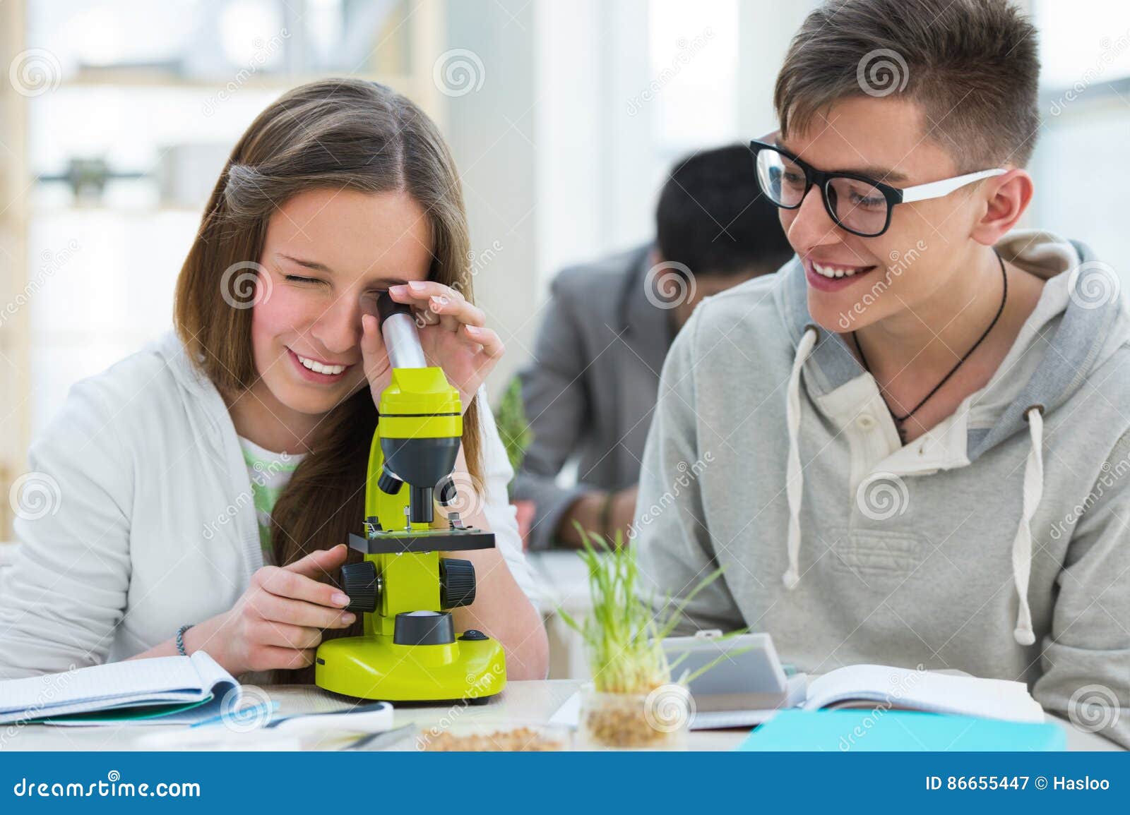 Group of Excited Students Working in Classroom Stock Image - Image of ...