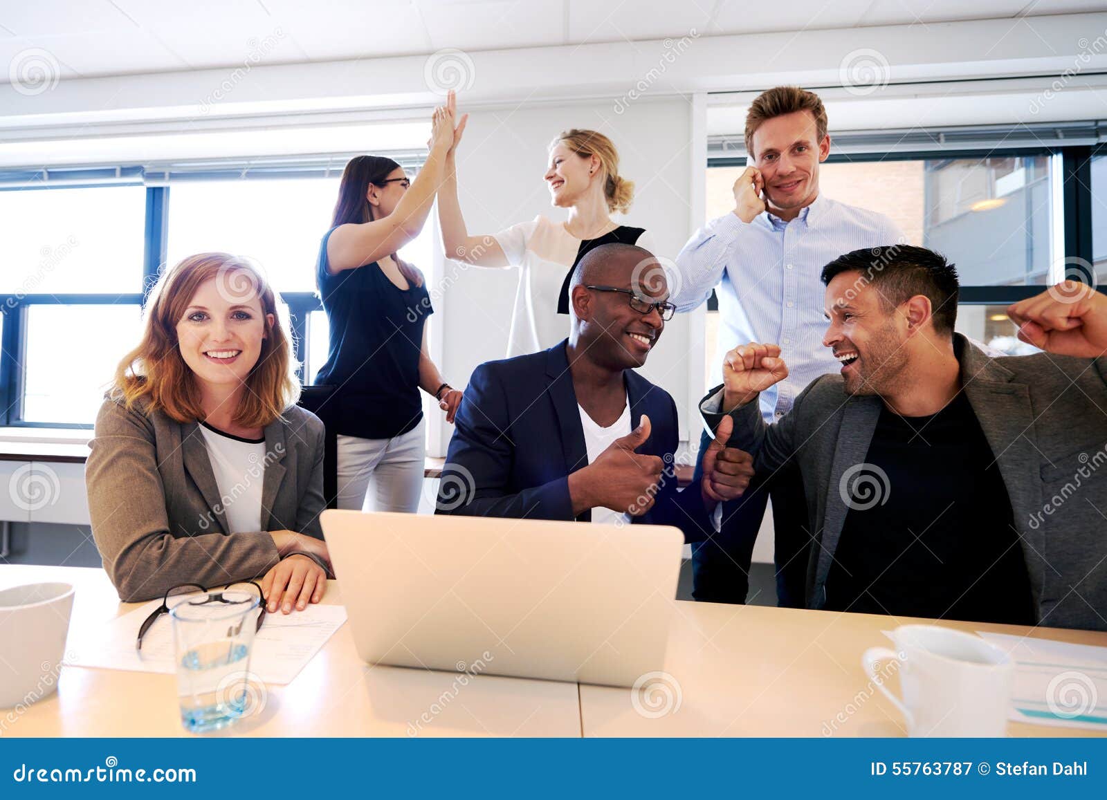 Group of Executives Celebrating Stock Image - Image of modern, table ...