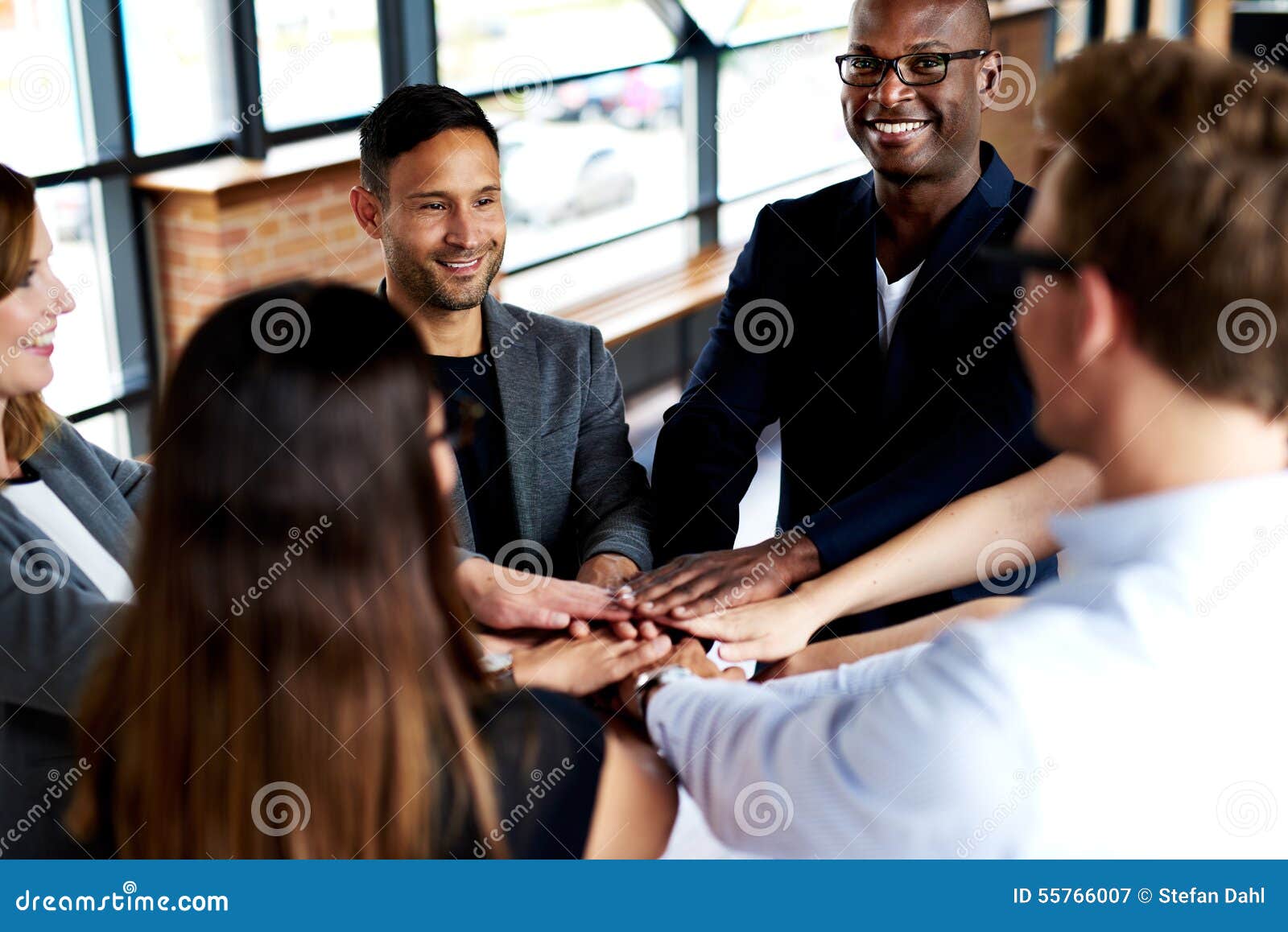 Group of Executives Standing with Hands Together Stock Image - Image of ...
