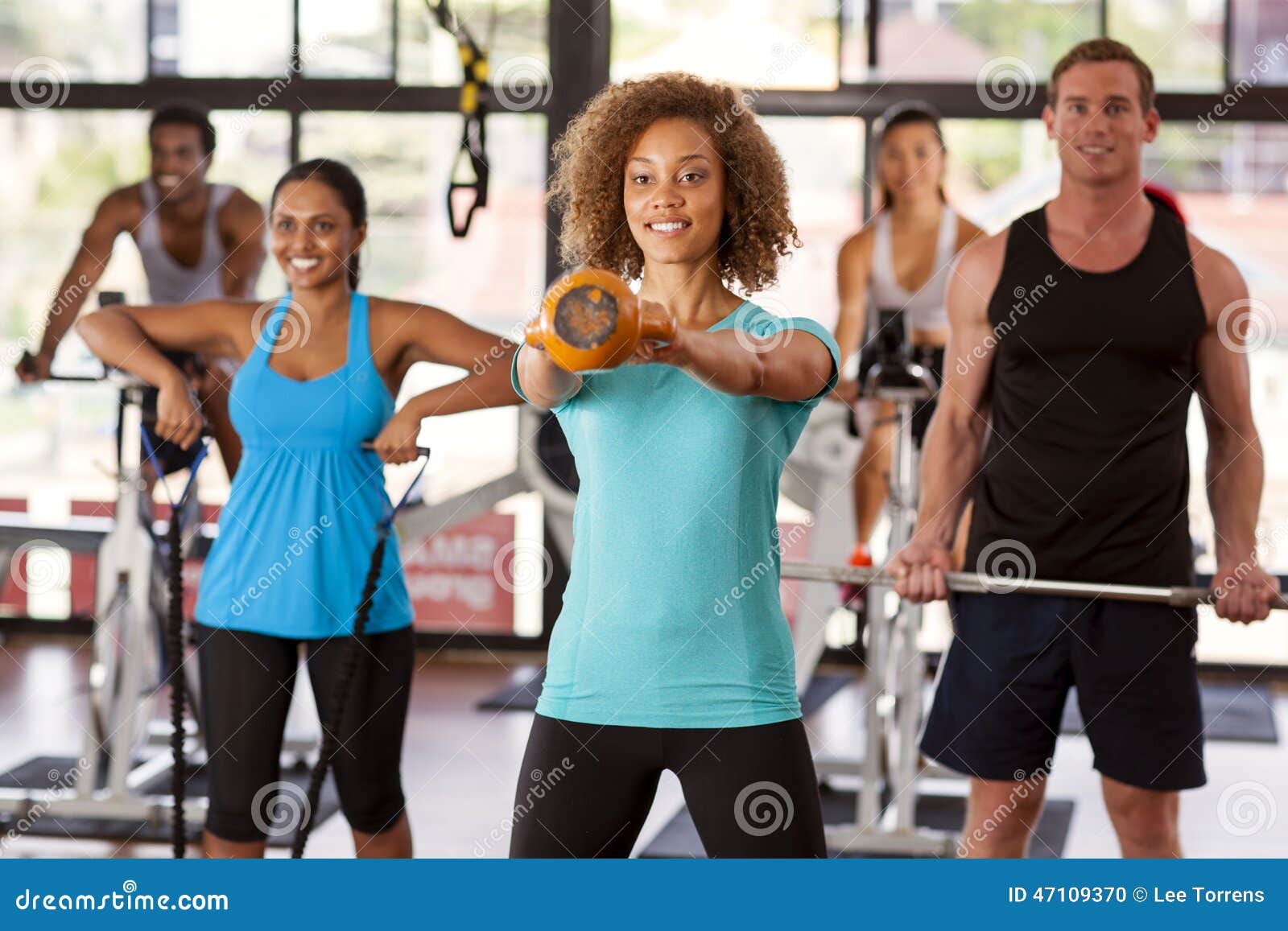 Group exercising in a gym stock photo. Image of woman - 47109370