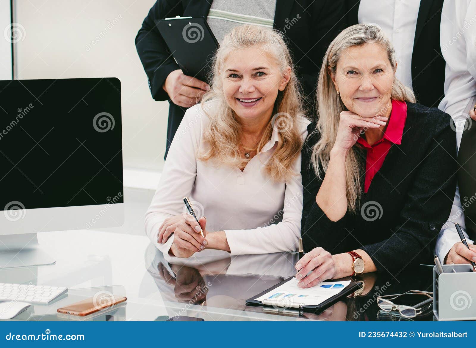 Group of Experienced Employees at the Workplace in the Office Stock ...