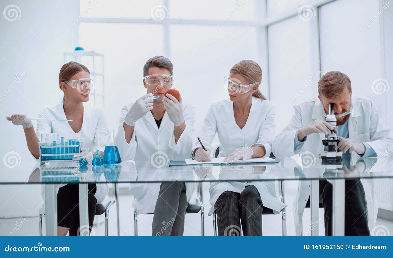 Group of Experts Checking the Quality of Apples Stock Photo - Image of ...