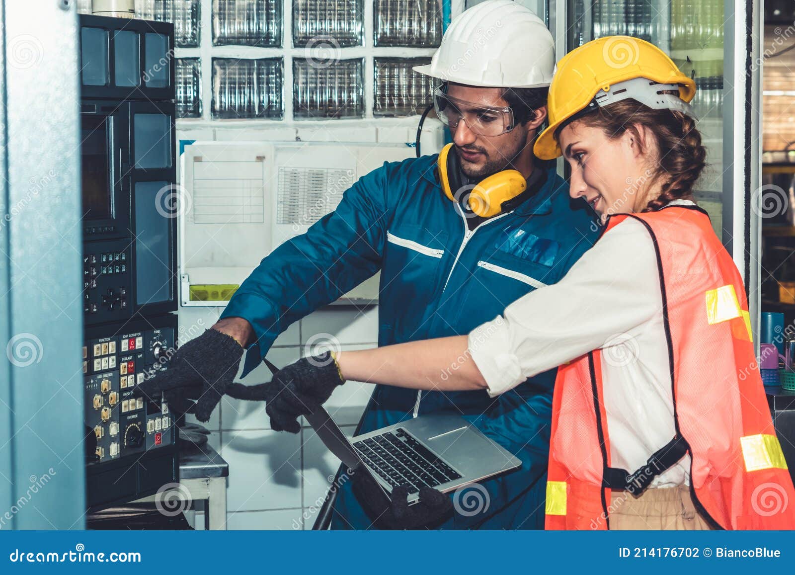 Group of Factory Job Workers Using Machine Equipment in Manufacturing ...