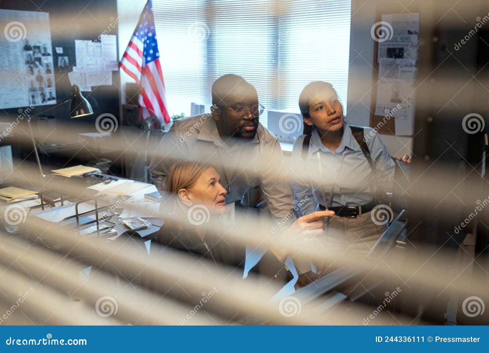 Group of FBI Agents Watching Record from Security Camera Inside Office ...