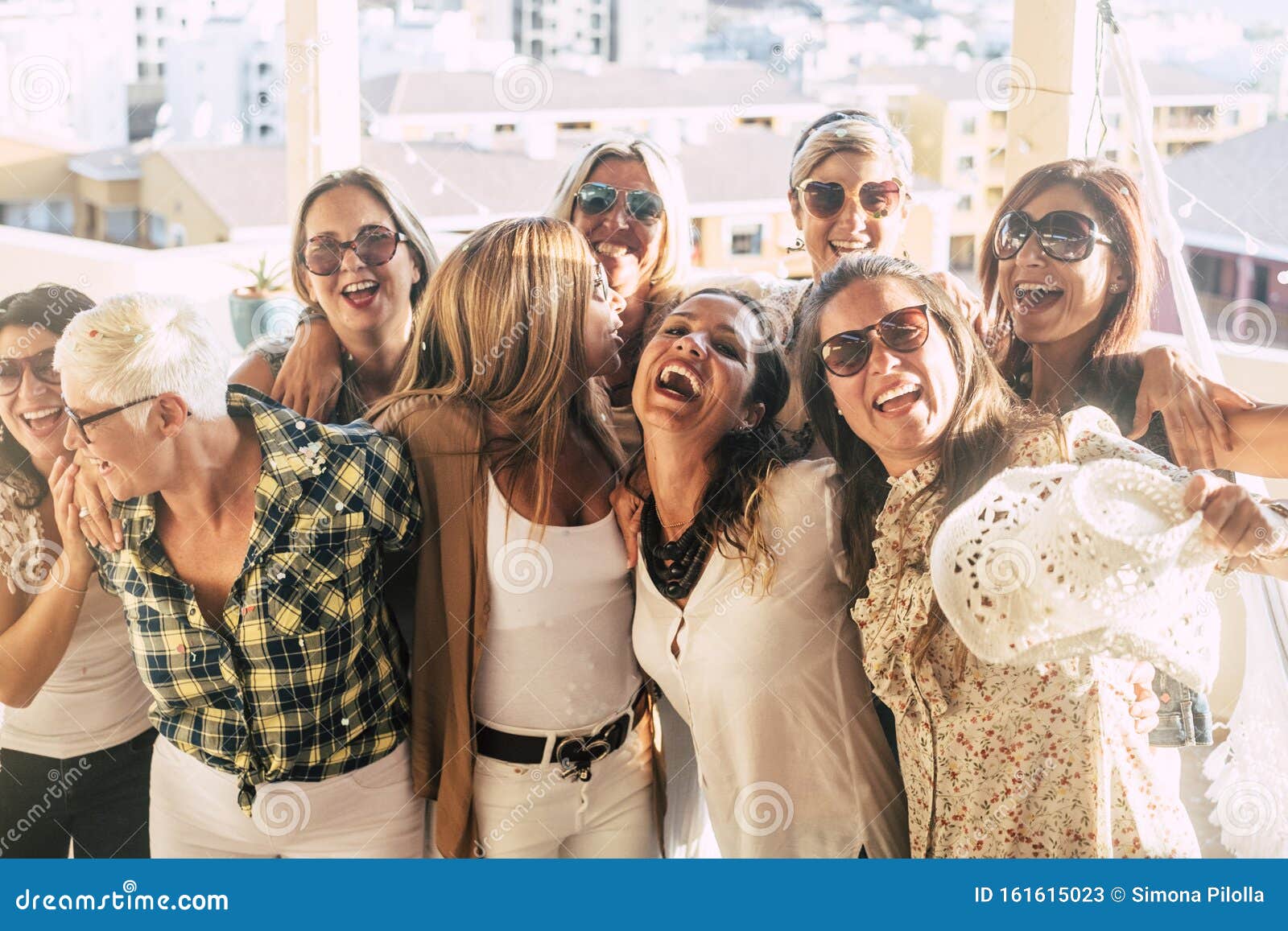 Group Of Female Adult Mixed Generations People Having Fun Together