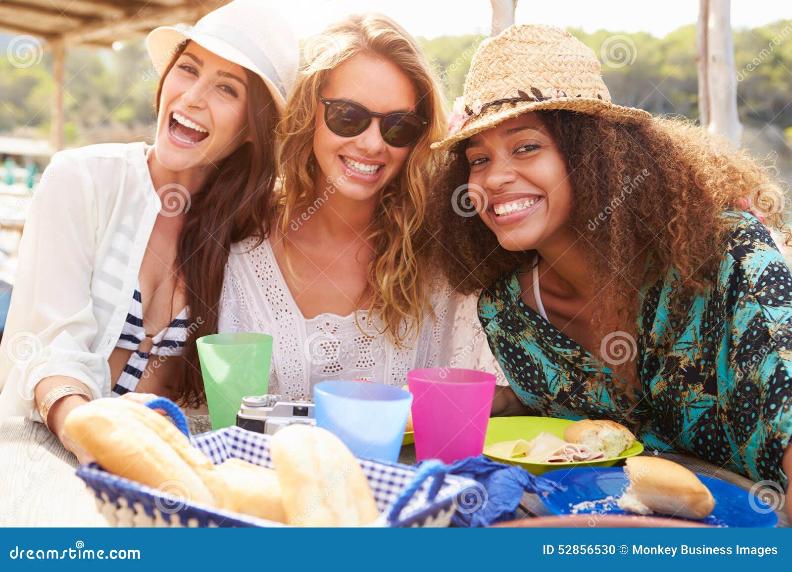 Group of Female Friends Enjoying Lunch Outdoors Stock Photo - Image of ...