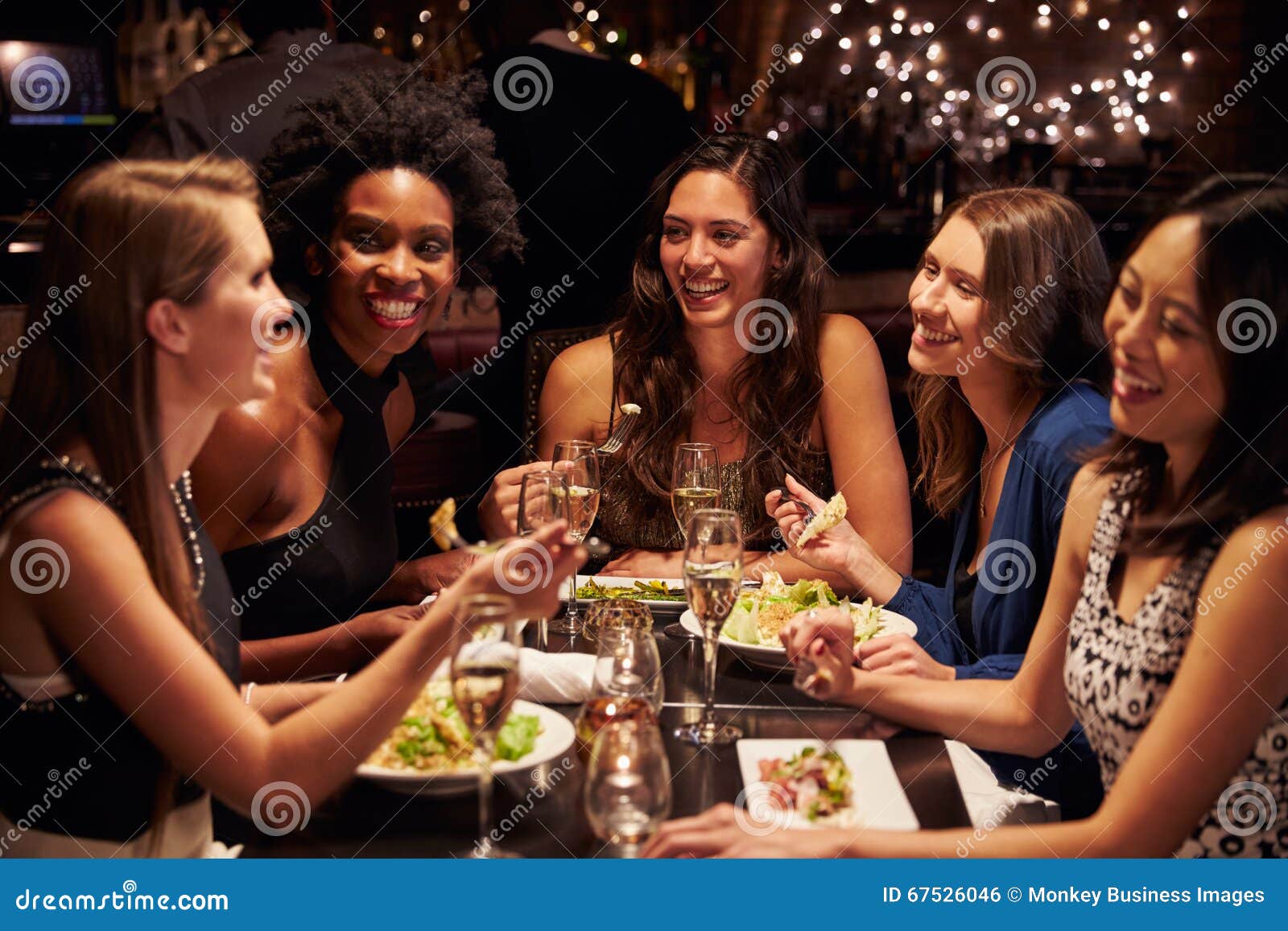 Group of Female Friends Enjoying Meal in Restaurant Stock Photo - Image ... Group of Female Friends Enjoying Meal in Restaurant Stock Photo - Image ...