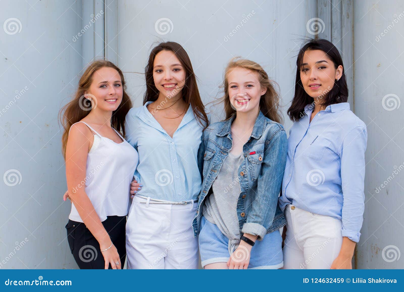 Group of Female Students Posing Together Outdoor and Looking at Camera ...