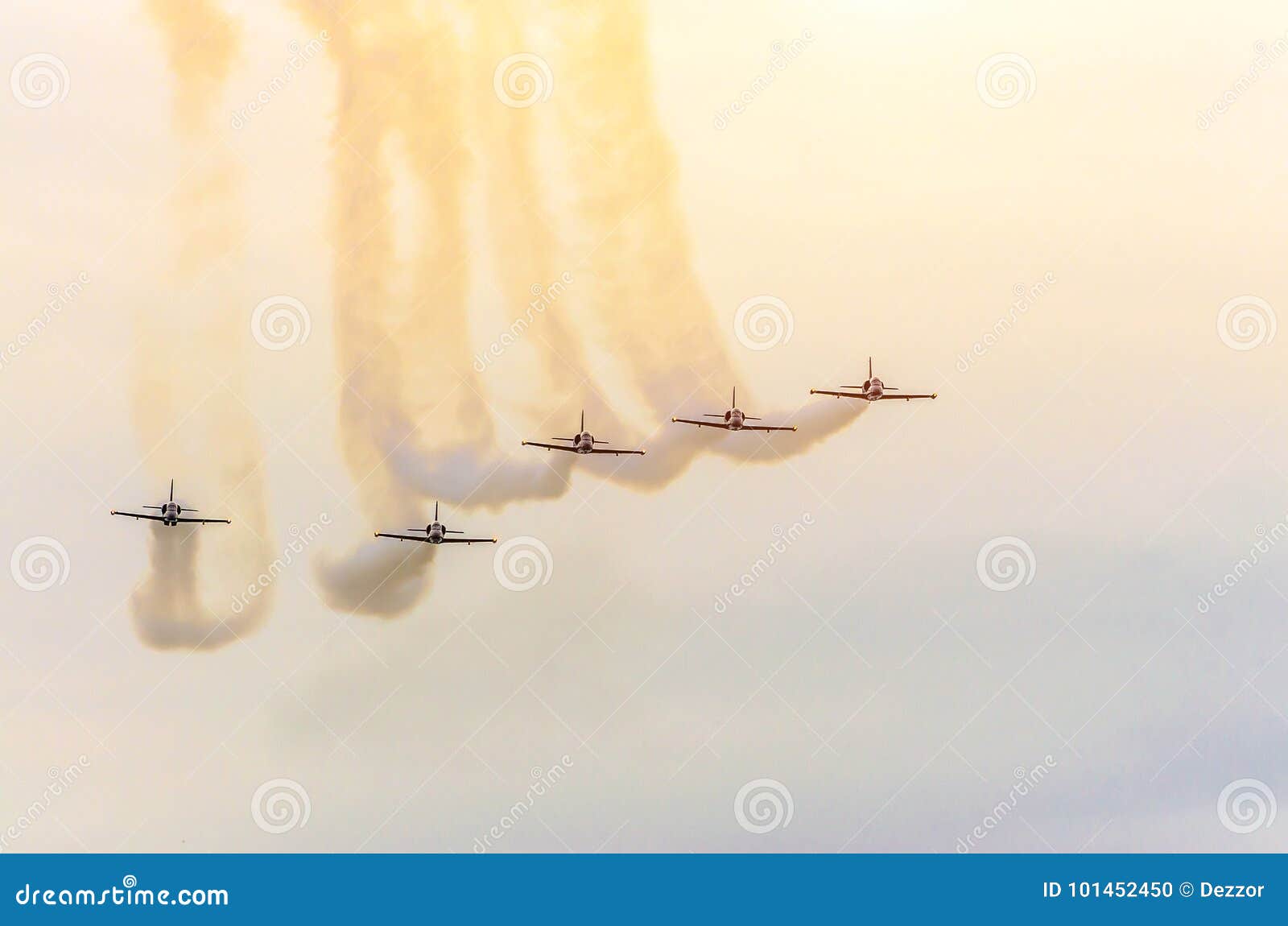 Group of Fighter Jet Airplane with a Trace of White Smoke Against a ...