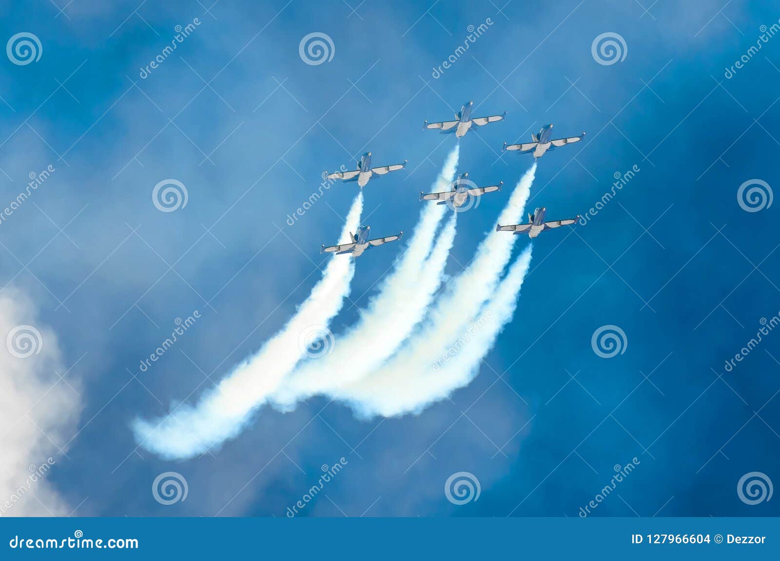 Group of Fighter Jet Planes Fly and Leave Behind a White Smoke Trail ...