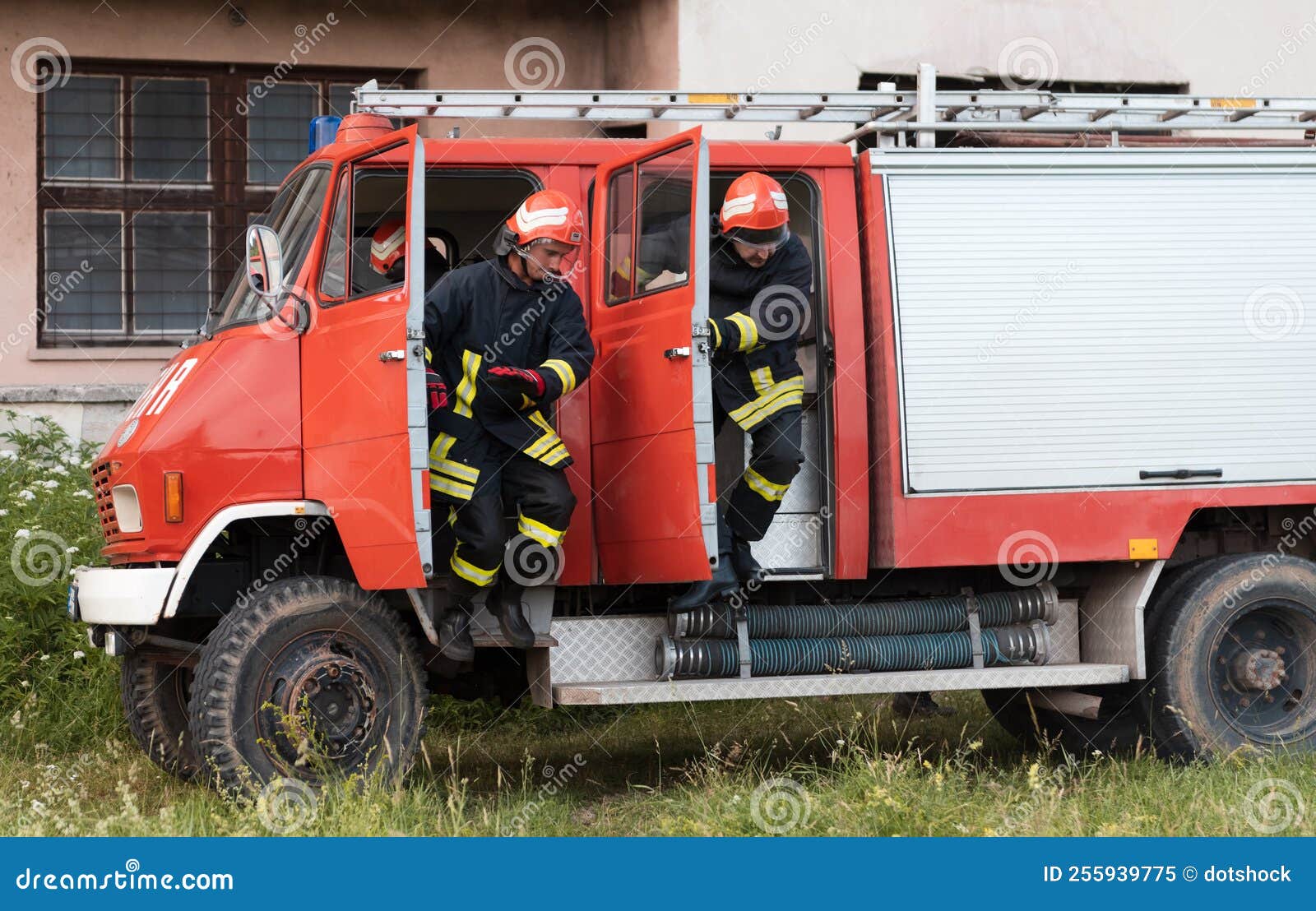 Group of Fire Fighters Standing Confident after a Well Done Rescue ...