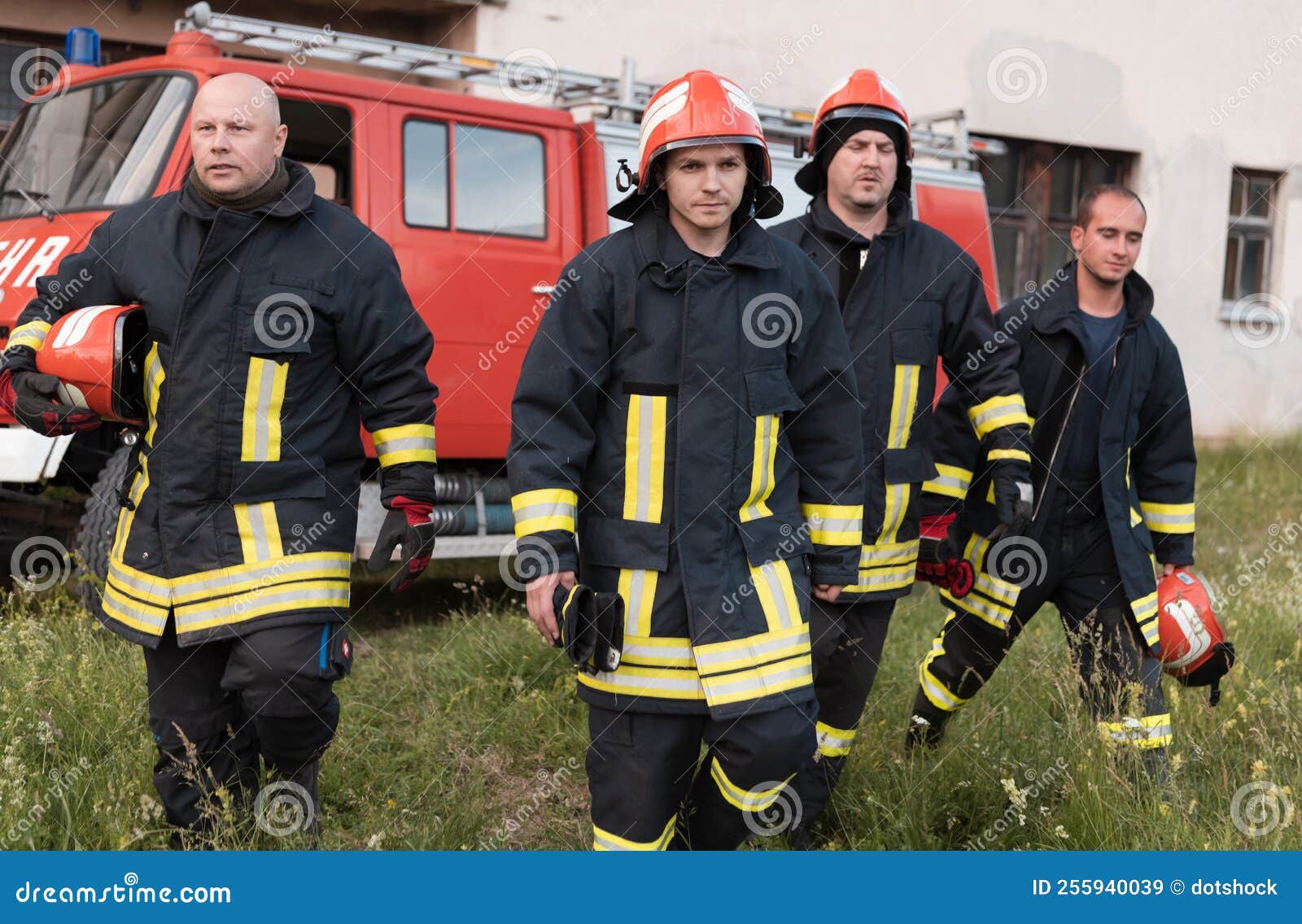 Group of Fire Fighters Standing Confident after a Well Done Rescue ...