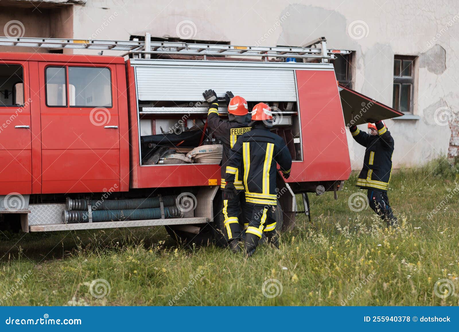 Group of Fire Fighters Standing Confident after a Well Done Rescue ...