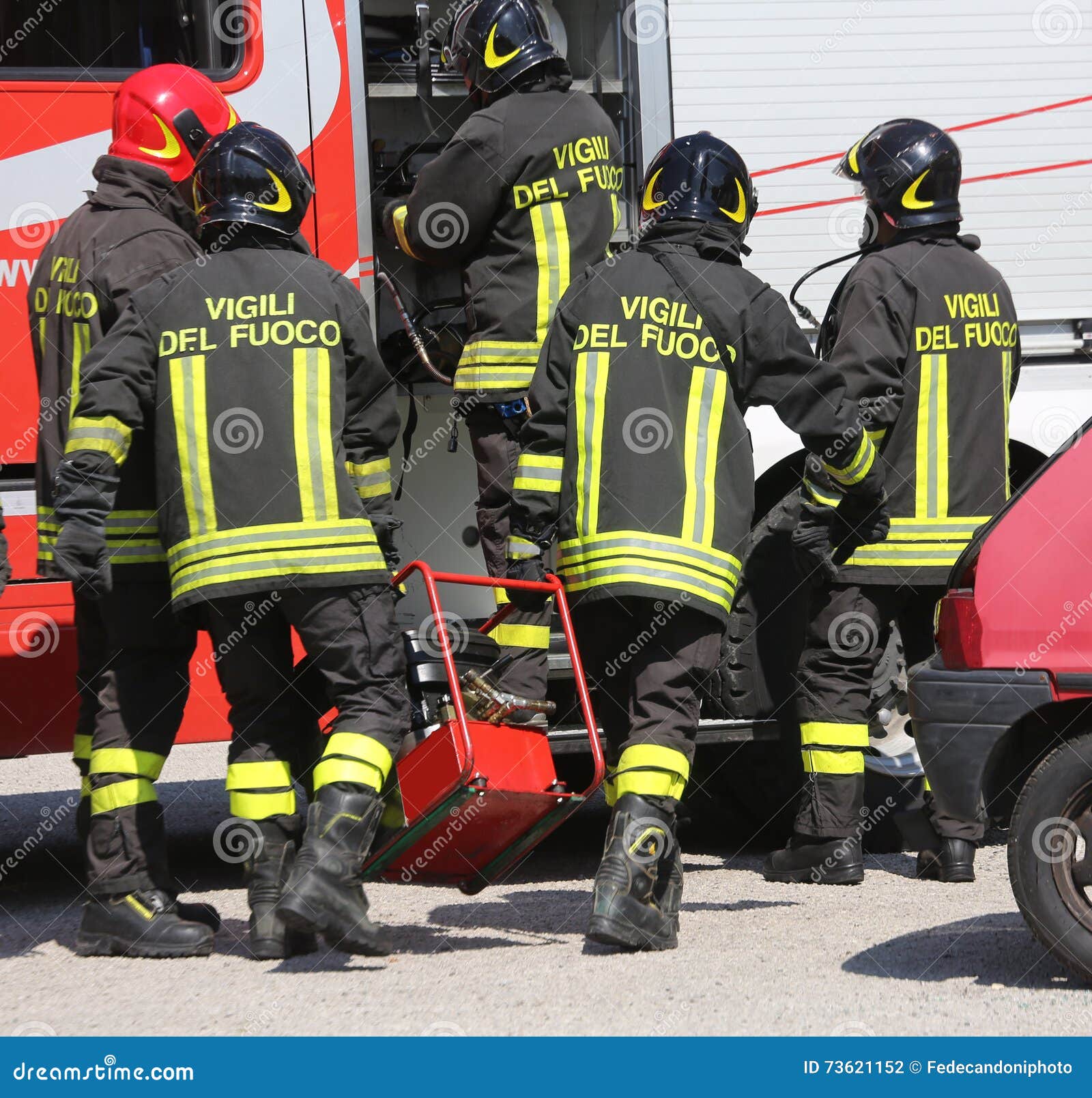 Group of Firefighters Working As a Perfect Teamwork Stock Photo - Image ...