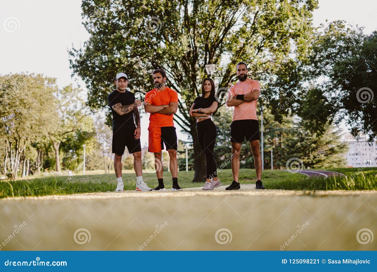 Group of Fit People Standing in the Park and Posing Stock Image - Image ...