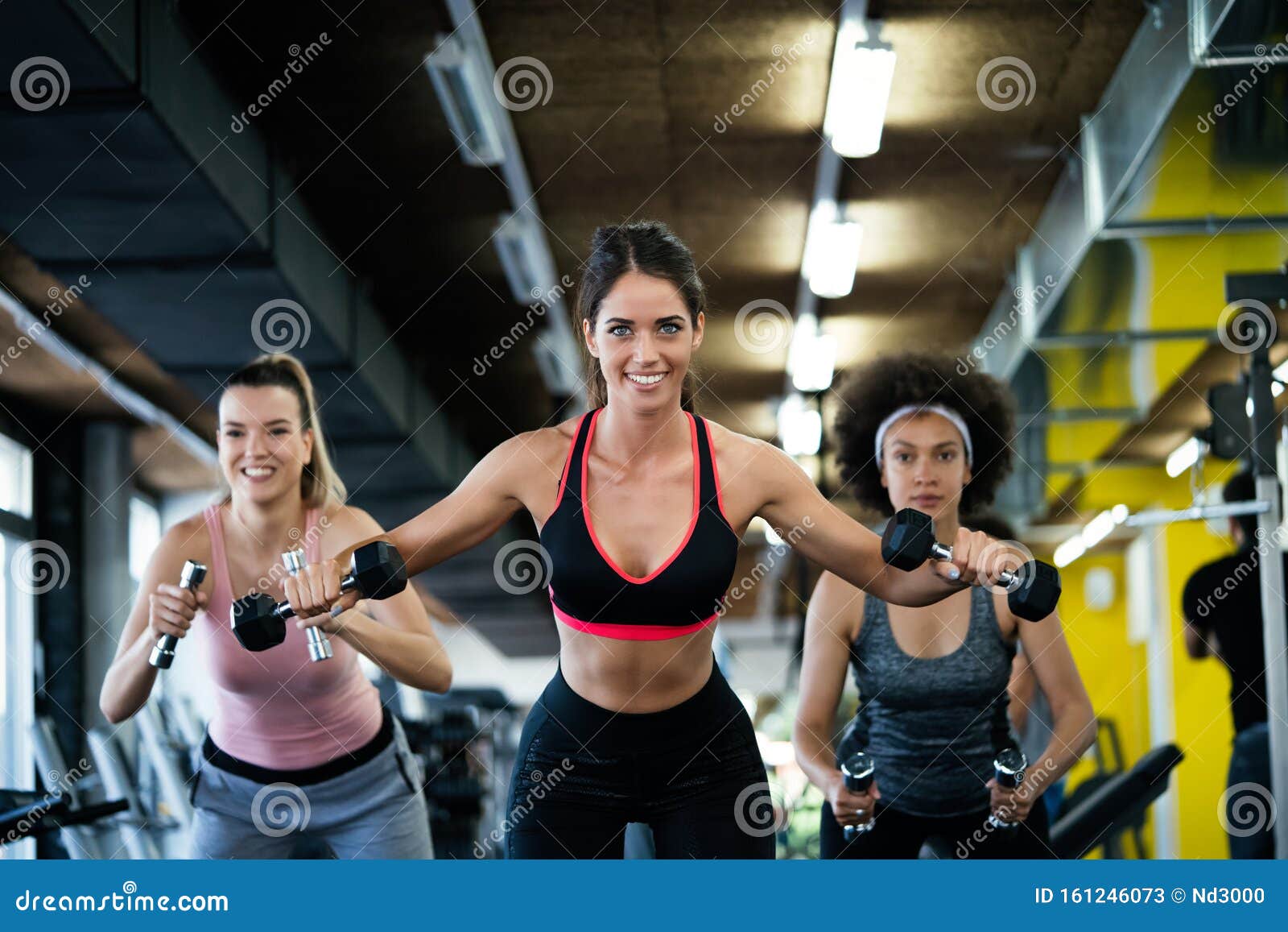 Group of Fit People at the Gym Exercising Stock Image - Image of person ...