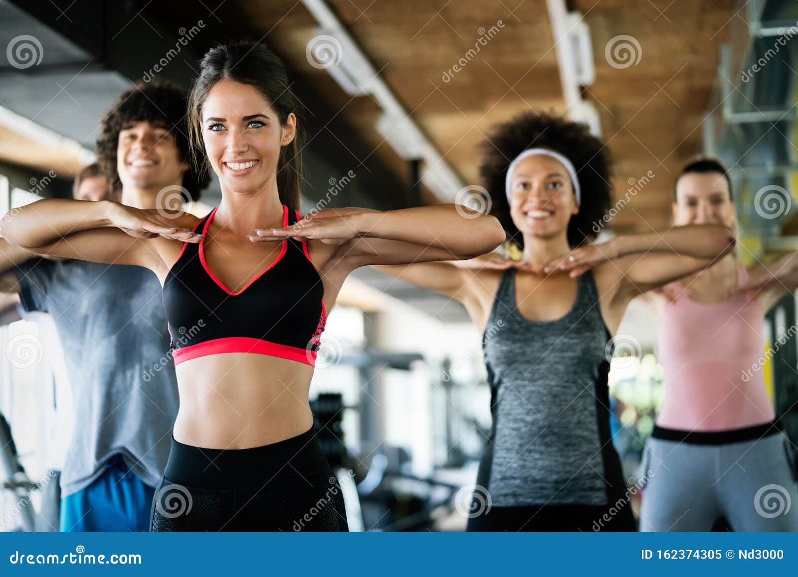 Group of Fit People at the Gym Exercising Stock Image - Image of body ...