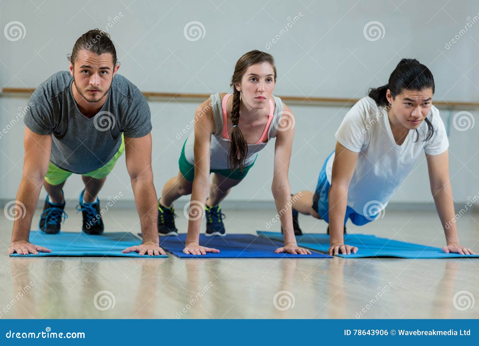 Group of Fitness Team Doing Push Ups Stock Photo - Image of chinese, activity: 78643906