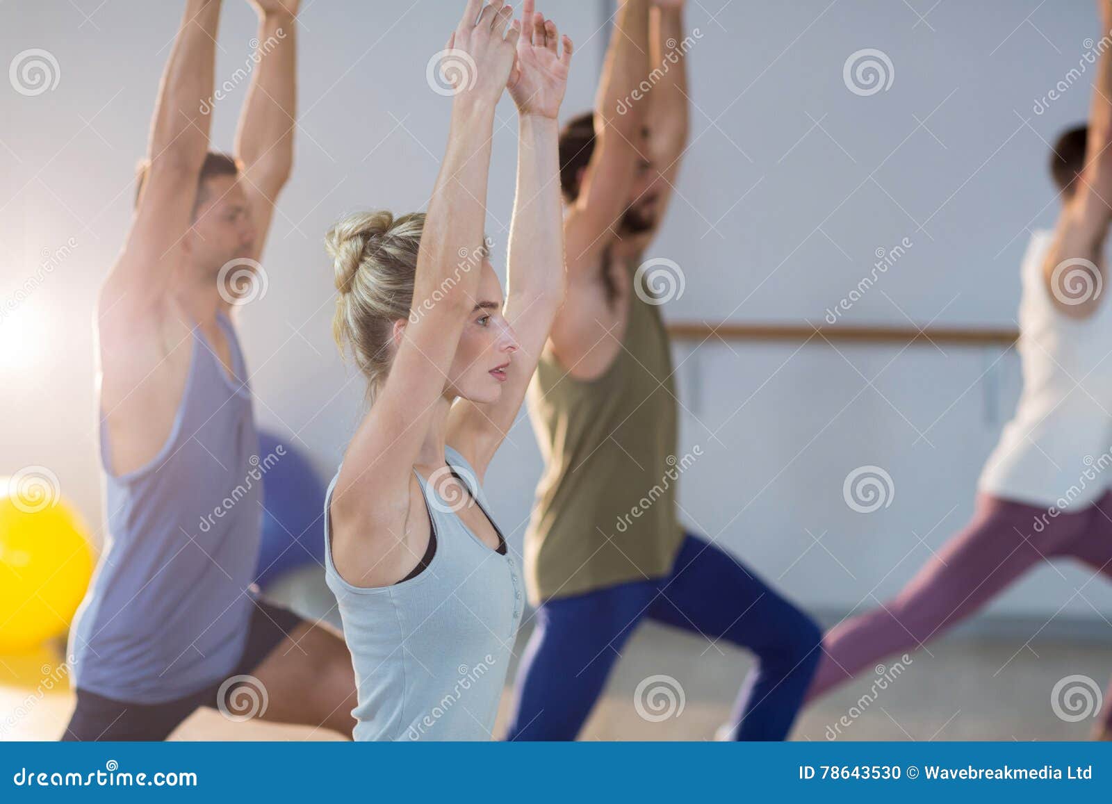 Group of Fitness Team Performing Stretching Exercise Stock Photo ...