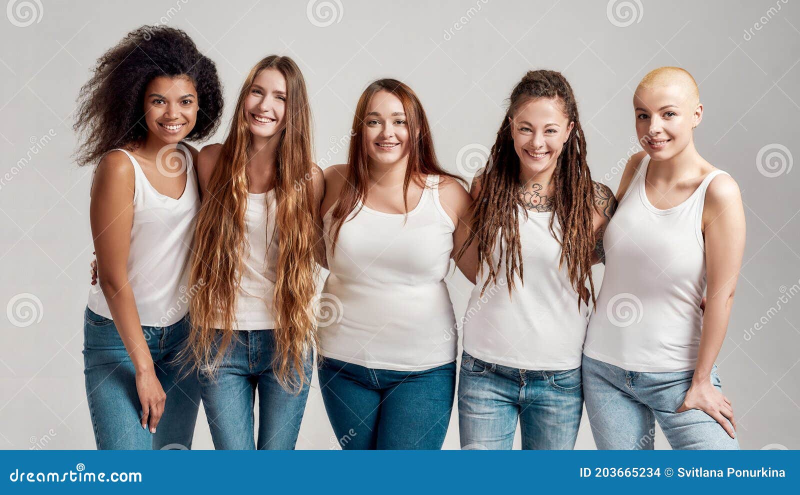 Group Of Five Beautiful Diverse Young Women Wearing White Shirt And