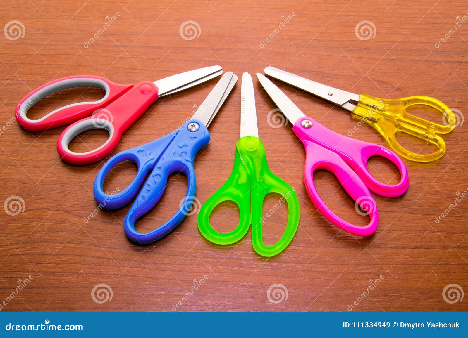 Group of Five Colored Scissors on Wood Tabble. Stock Image - Image of ...