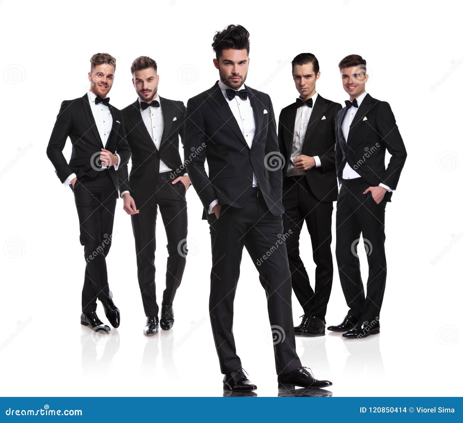 Group of Five Handsome Grooms with Relaxed Leader in Front Stock Photo ...