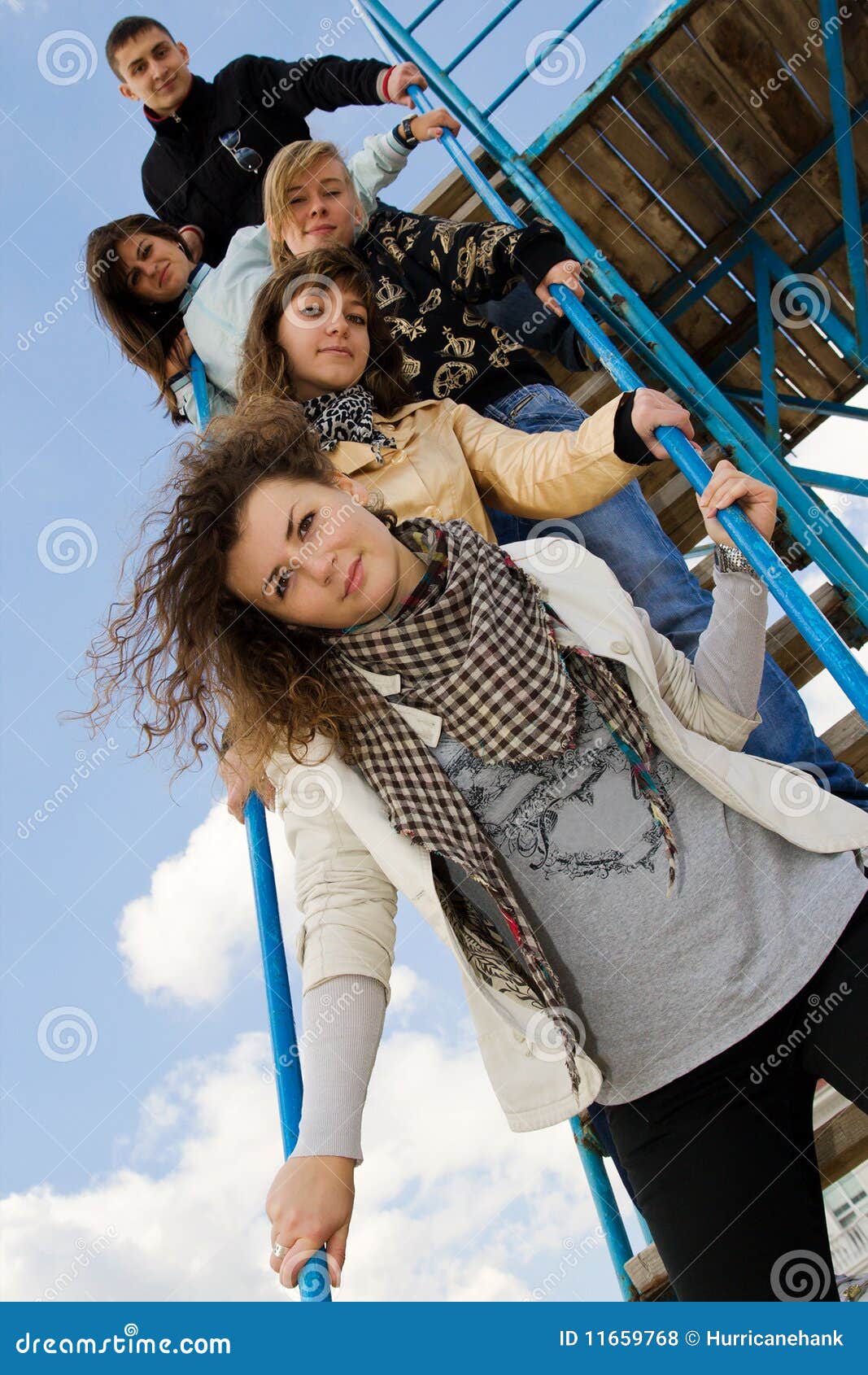 Group of Five Young People on the Stairs Stock Photo - Image of people ...