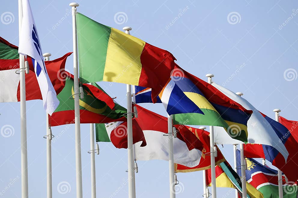 Group of Flags of Many Different Nations Against Blue Sky Stock Photo ...